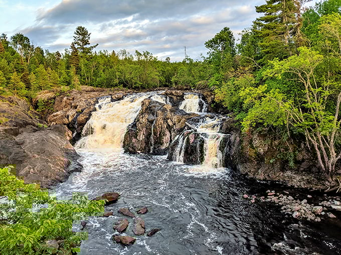 Front-row seats to nature's spectacle &ndash; the falls create a mesmerizing pattern of white foam against dark stone that never repeats exactly twice.