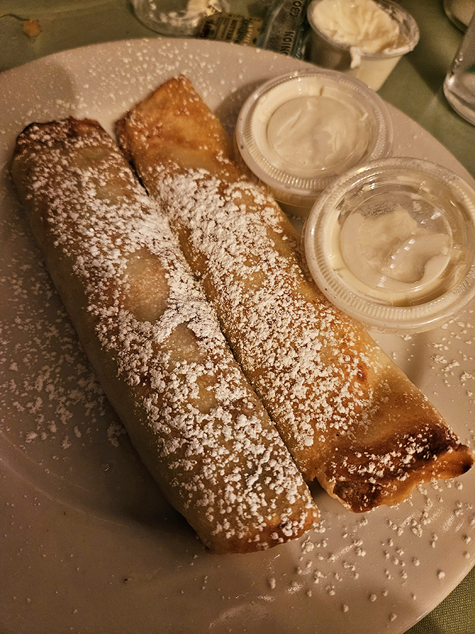 These aren't just any pancakes &ndash; they're naleśniki, delicate Polish crepes dusted with powdered sugar and served with sweet cheese filling that'll make you forget about ordinary breakfast forever.