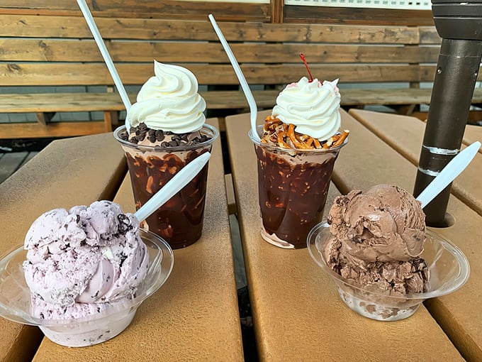 Summer perfection captured in plastic cups &ndash; layers of ice cream, fudge, and toppings creating edible architecture that's almost too beautiful to eat. Almost.