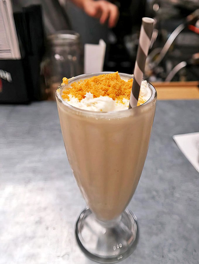 Milkshake: This isn't just a milkshake &ndash; it's a creamy masterpiece topped with crushed butterscotch that makes you wonder why you'd ever waste calories on lesser desserts.