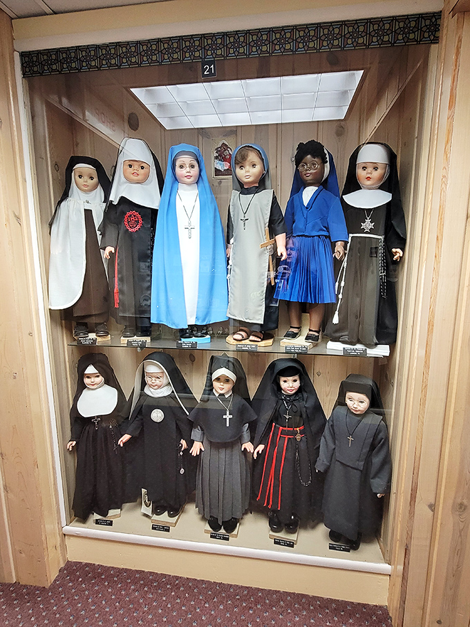 These diminutive sisters in their tiny habits represent different religious orders, standing as silent witnesses to centuries of devotion and service.