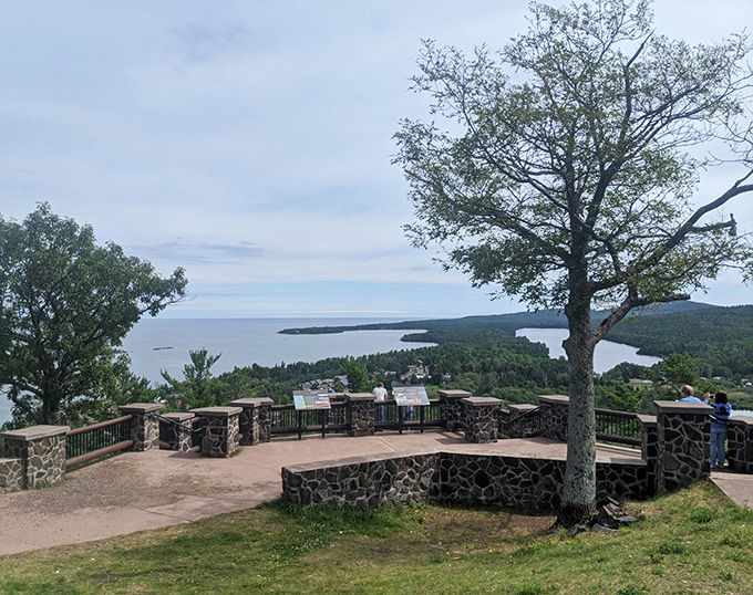 Where earth meets sky in perfect harmony, this viewing platform transforms ordinary travelers into momentary poets contemplating life's vastness.