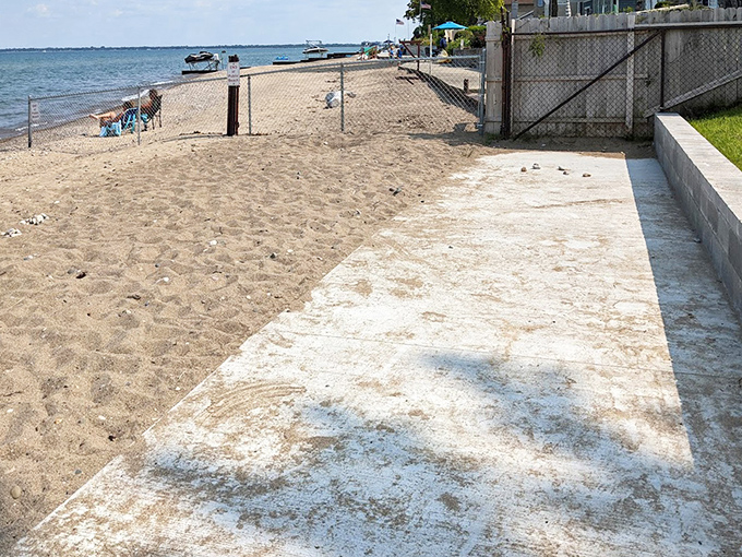 Sandy pathways invite bare feet and wandering souls, leading beachgoers to their perfect spot along this uncrowded Lake Huron treasure.