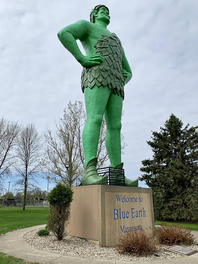 From this angle, you can appreciate the giant's impressive profile and the detailed texture of his leafy tunic against the Minnesota sky.