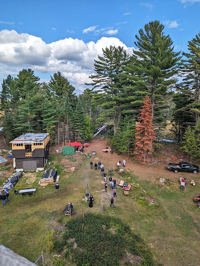 A bird's-eye view reveals the castle grounds nestled in Wisconsin's northwoods, where medieval fantasy meets Midwest charm.