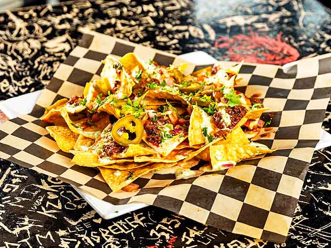 These aren't your average nachos&mdash;they're a mountain range of flavor with valleys of cheese and peaks of jalape&ntilde;os that demand exploration with every crunchy bite.