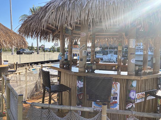 Rustic bamboo details and colorful decorations give each floating tiki bar the authentic island vibe that perfectly complements Key West's laid-back atmosphere.