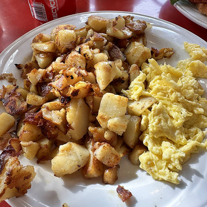 These aren't just any home fries&mdash;they're little golden nuggets of potato perfection, crispy outside and fluffy inside, seasoned by decades of griddle wisdom.