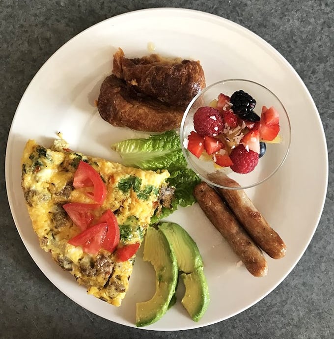 Breakfast Meal: Not your average continental spread &ndash; this gourmet morning feast features fresh ingredients arranged with artistic flair that tastes even better than it looks.