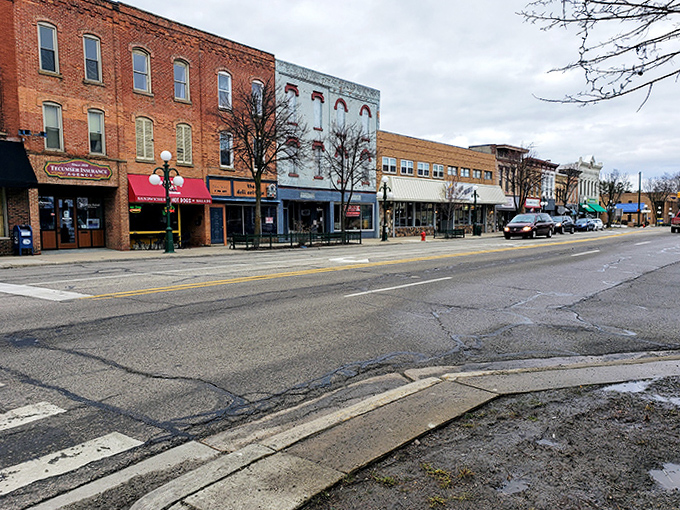 Main Street's brick buildings stand shoulder to shoulder, a lineup of architectural personalities that have watched generations come and go.