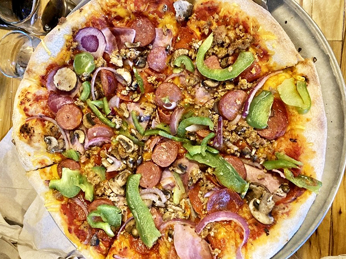 The Deluxe Vegan pizza piles on toppings with the enthusiasm of a manager arguing with an umpire &ndash; passionately and with total conviction.