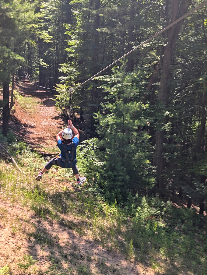 Descending the Zipline: That magical moment when terror transforms into pure joy. Facial expressions here range from "superhero" to "forgot to close my mouth."
