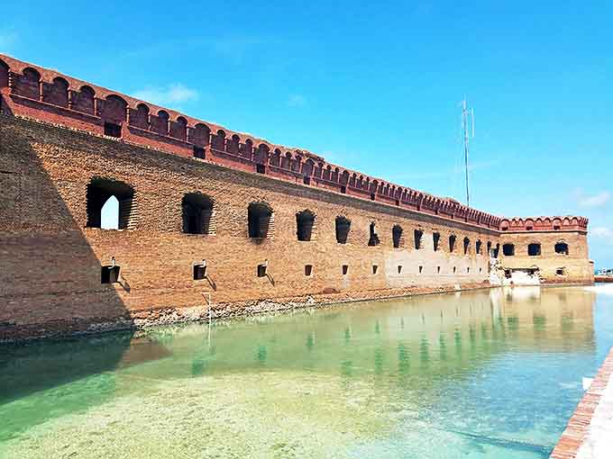 Massive fortress walls meet crystal waters in a surreal juxtaposition. History and natural beauty playing nicely together for your vacation photos.