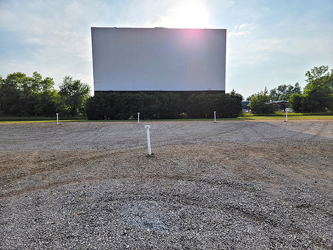 Movie night innovation at its finest, pickup truck transformed into the world's coziest theater seat, complete with blankets and pillows under the stars.
