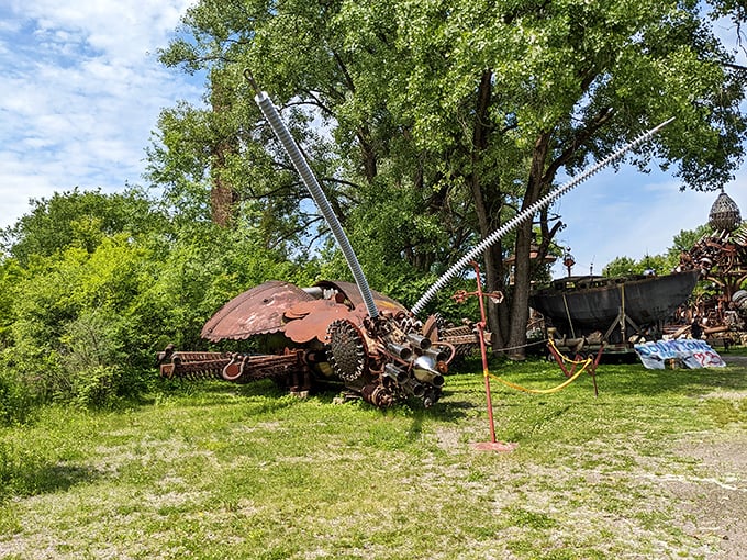 This playful insect-like machine mixes farm charm with sci-fi flair, delighting visitors who love imaginative sculptures and creativity all around.