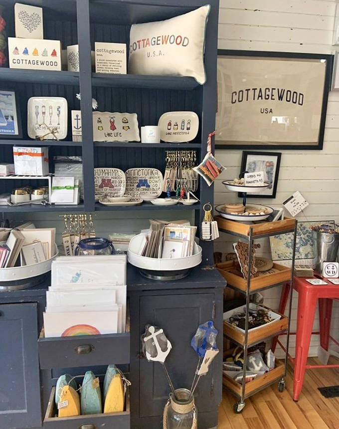 Cottagewood-branded merchandise and nautical-themed gifts celebrate lake living with style and local pride.