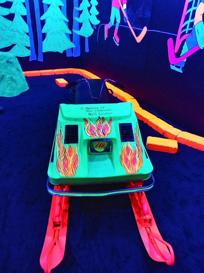 This isn't just transportation – it's art! A neon snowmobile tribute glows with the spirit of Upper Peninsula winter fun.