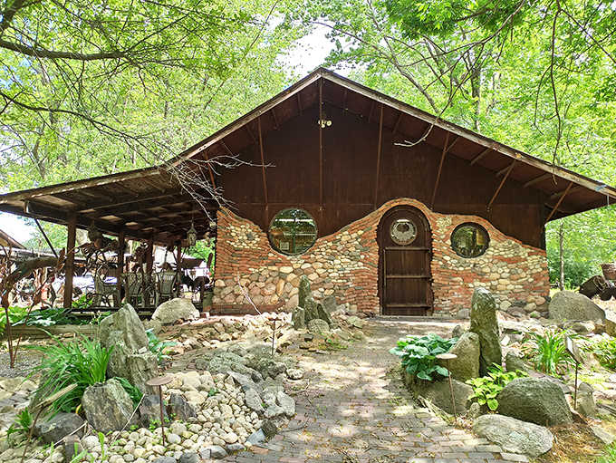 The Hobbit House looks like it was plucked straight from Middle-earth, offering a charming contrast to the metal beasts outside.