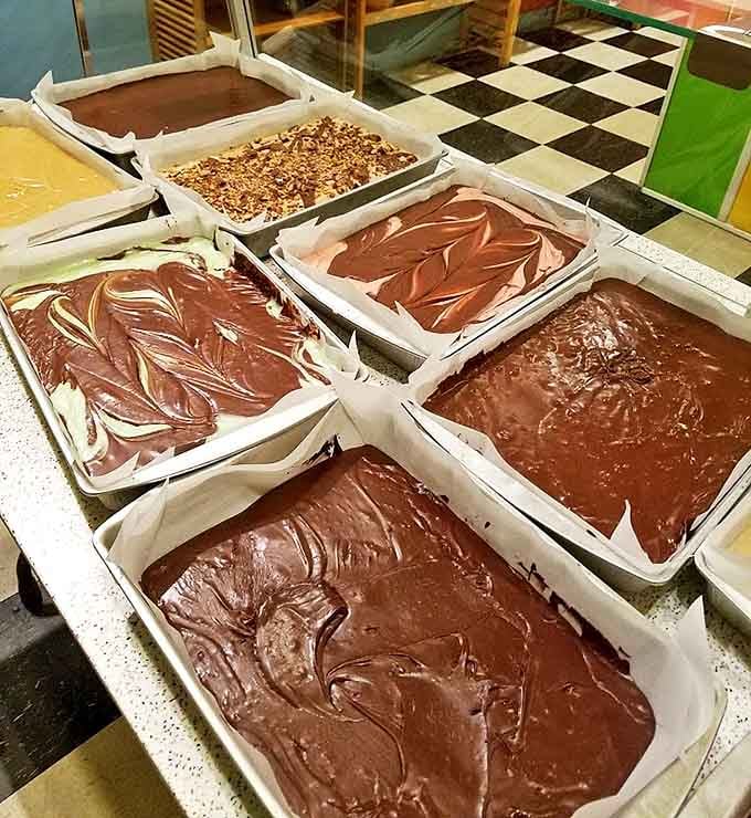 Freshly made fudge awaits its destiny &ndash; to disappear mysteriously within minutes of purchase despite your "saving it for later" promises.