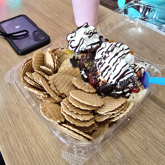 Ice cream nachos? Genius! Crispy waffle cone pieces surround a mountain of ice cream drizzled with chocolate &ndash; the dessert equivalent of striking gold.