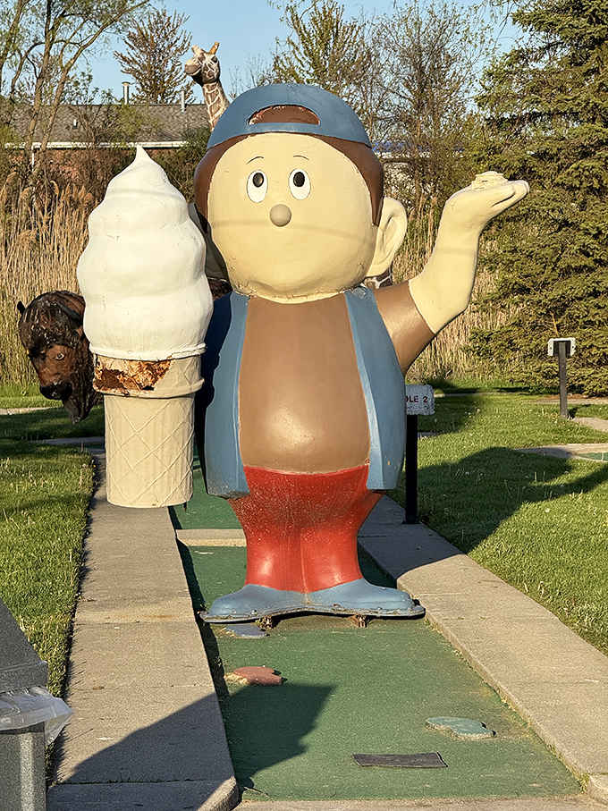The surprised ice cream boy statue stands eternal guard, his wide-eyed wonder matching exactly how you'll feel after your first bite of premium frozen custard.