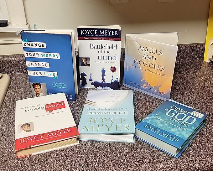 The inspirational section offers literary chicken soup for the soul, with Joyce Meyer's wisdom prominently displayed for those seeking spiritual guidance.