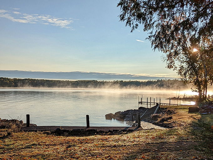 Lakeside Sunrise: Morning mist dances across still waters as the sun begins its daily performance – worth setting the alarm for, even on vacation.
