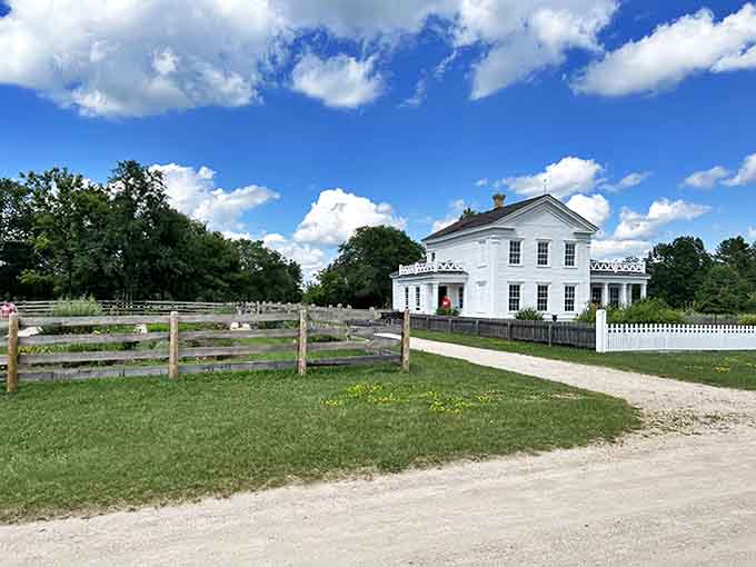 This white farmhouse screams "we made it" in the most dignified, Victorian way possible.