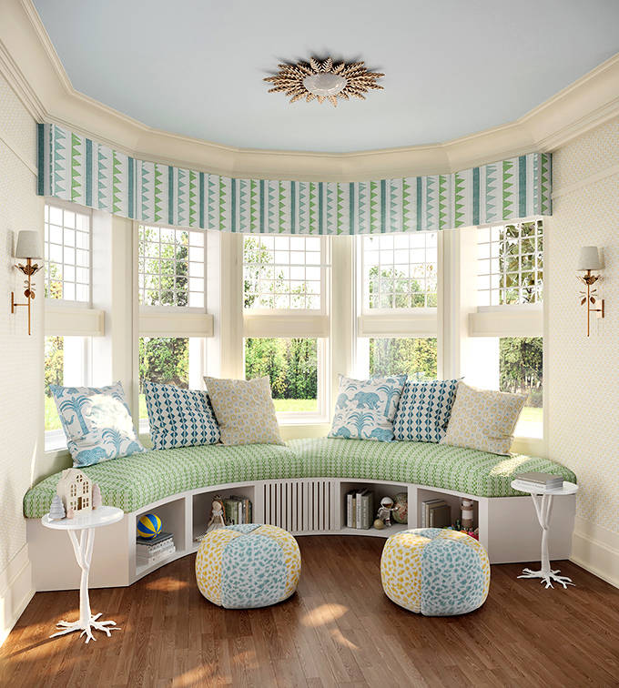 A curved window seat bathed in natural light creates the perfect nook for daydreaming or diving into a good book.
