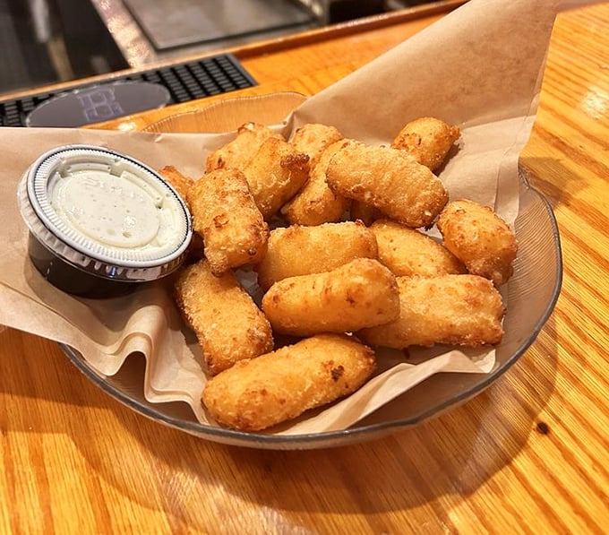 Golden-brown mac and cheese bites that shatter with each bite &ndash; childhood comfort food dressed up for a night out.