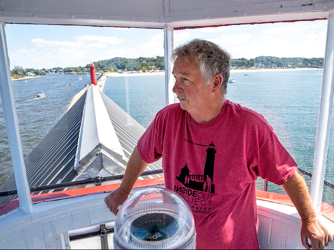 Inside the lantern room, where lighthouse keepers once tended the vital flame that guided countless mariners safely home.