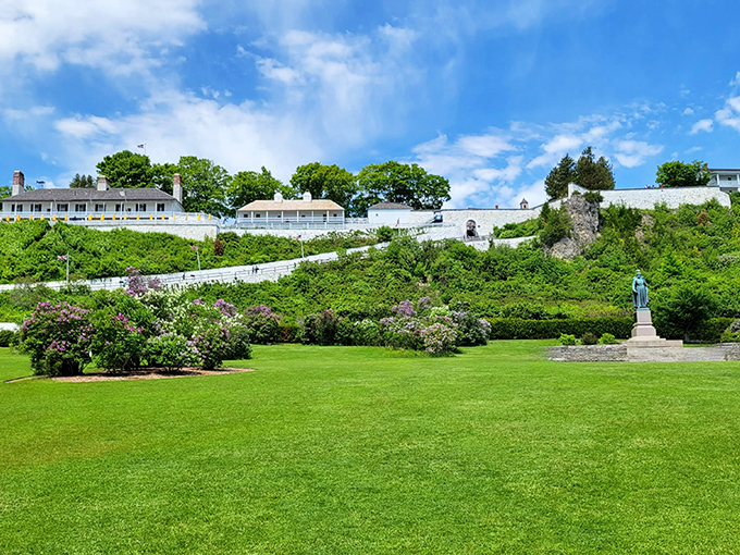Marquette Park's manicured lawns and blooming gardens create a peaceful scene, though some visitors report seeing Victorian-era picnickers who vanish when approached.