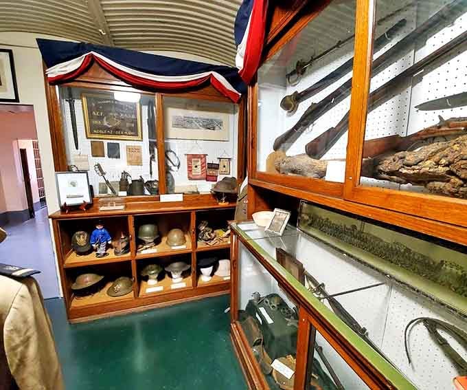 From helmets to rifles, this military history display case honors local veterans who served in conflicts spanning generations.