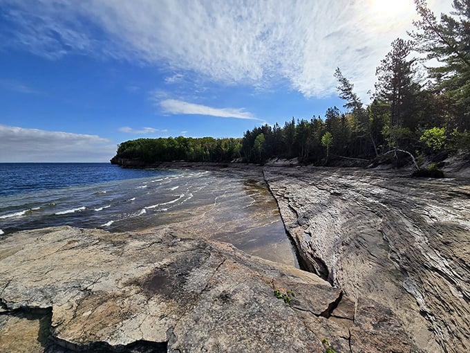 Mosquito Beach offers smooth stone shelves that slope gently into Lake Superior's crystal waters &ndash; nature's perfect diving board.