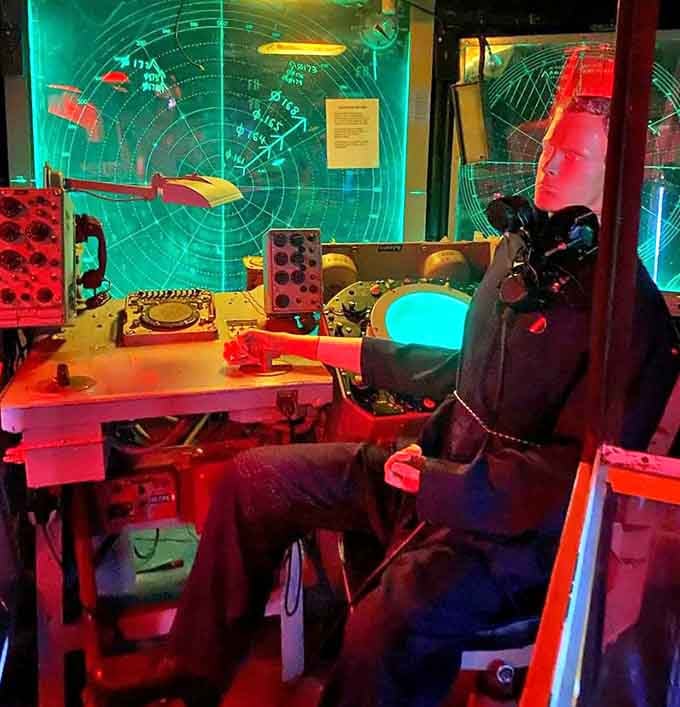 Mannequins stand watch in silent testimony to the sailors who once called these cramped metal corridors home for months at sea.