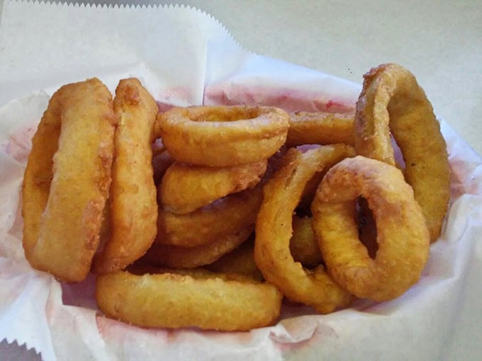 Onion Rings: Golden halos of crispy, battered goodness that shatter satisfyingly with each bite &ndash; these aren't just sides, they're main attractions in disguise.
