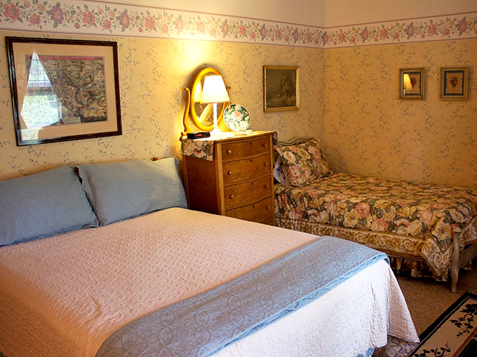 Floral wallpaper and cozy beds, like sleeping in your grandmother's house, if your grandmother had impeccable taste.