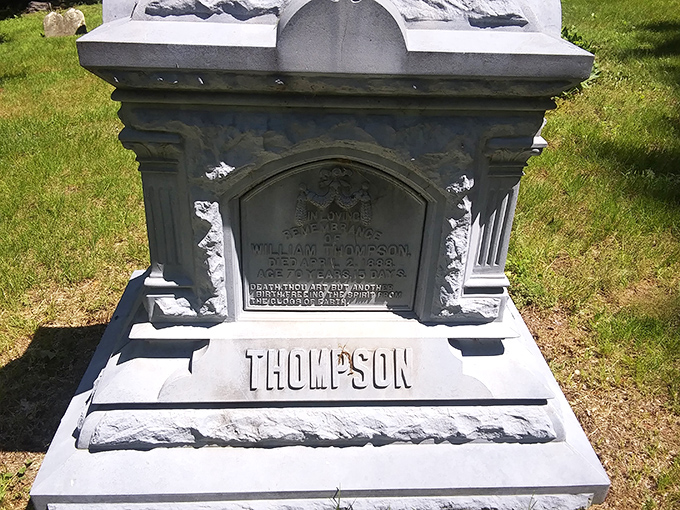 Ornate Victorian craftsmanship adorns this Thompson family monument, showcasing the artistry that once transformed grief into lasting beauty.