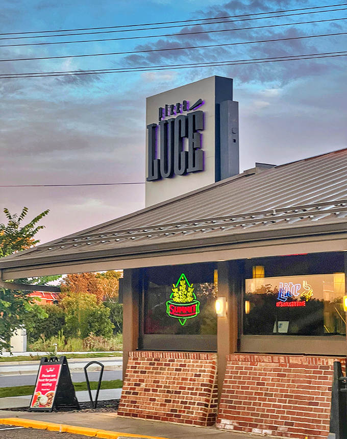 The neon sign beckons hungry visitors to this local favorite, where creative pies satisfy both traditional tastes and adventurous palates.