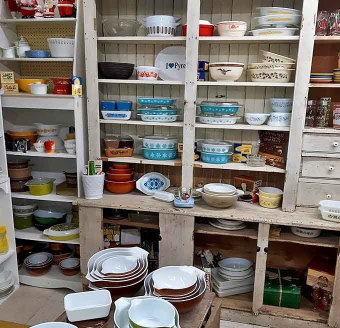 Pyrex paradise! Colorful vintage dishware stacked like a time capsule of American kitchens past &ndash; grandmother's cooking never looked so good.