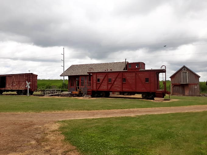 That red caboose isn't just for show, it represents the railroad connections that transformed isolated frontier settlements into thriving communities practically overnight.