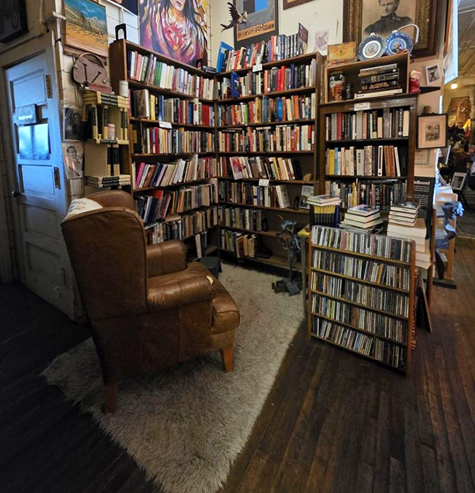 Floor-to-ceiling shelves create literary canyons to explore, with each turn revealing new genres and unexpected finds.