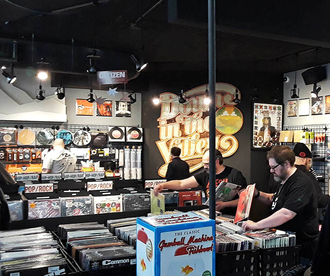 Shoppers examine potential finds with the focused concentration of archaeologists, each hoping to unearth that perfect item at an unbeatable price.