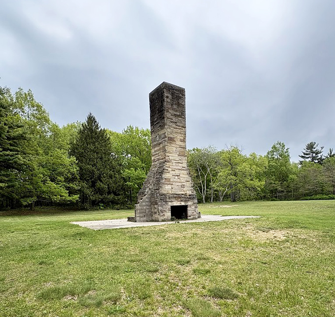 Stone Chimney Structure: This silent sentinel stands as a reminder of simpler times, when campfires and ghost stories ruled summer evenings.