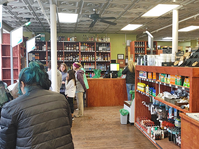 Vintage tin ceilings watch over modern transactions, where friendly cashiers turn grocery shopping into a genuine human connection.