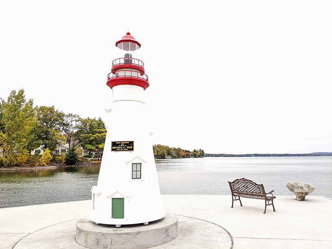 This charming lighthouse replica stands sentinel over Torch Lake's azure waters &ndash; a perfect spot for contemplating life's bigger questions.