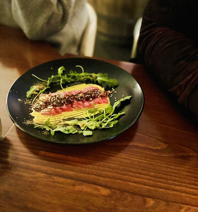 Tuna carpaccio that's dressed better than most people at fashion week &ndash; a delicate balance of flavors that whispers rather than shouts.