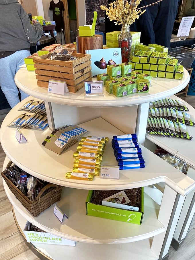 A chocolate lover's dream display &ndash; rows of meticulously crafted treats arranged like the world's most delicious art exhibition.