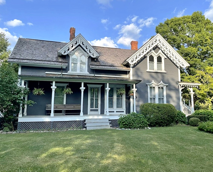 Victorian-era elegance comes alive in this beautifully preserved home, where front porches weren't just architectural features but social networking platforms of their day.