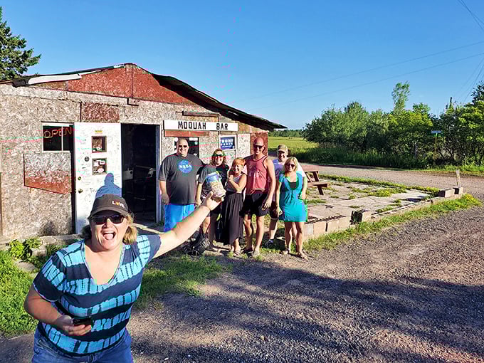 Visitors pose outside this legendary watering hole, each leaving with stories that'll last longer than their hangovers.